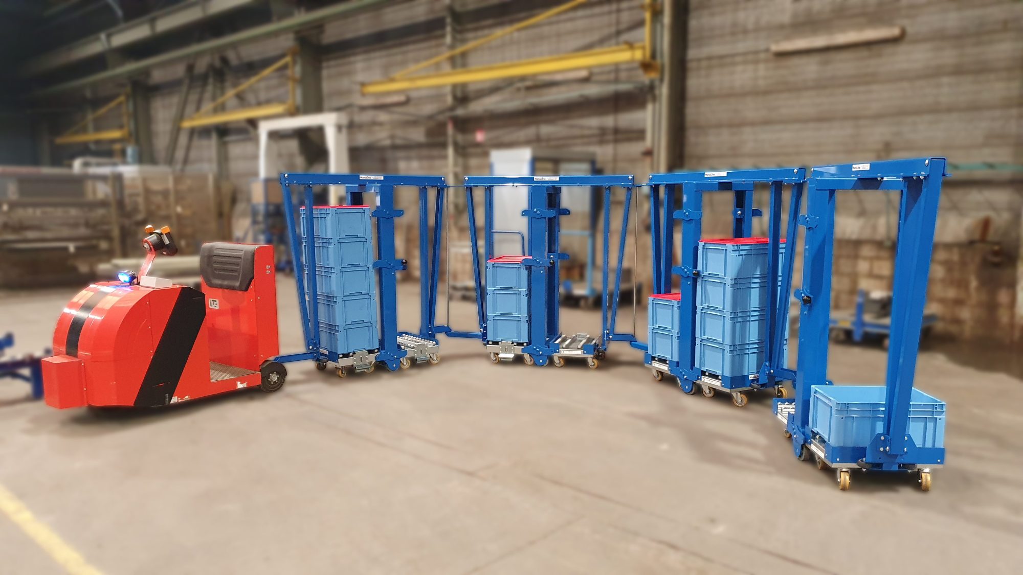 Case study: custom-built tugger train for transporting 600 x 400-mm ...